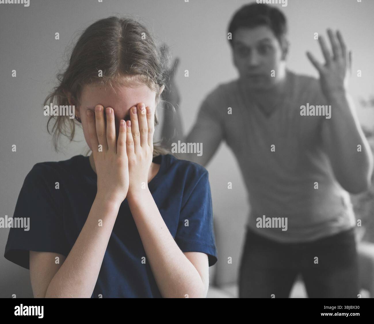 Angry father yelling at his daughter at home Stock Photo - Alamy