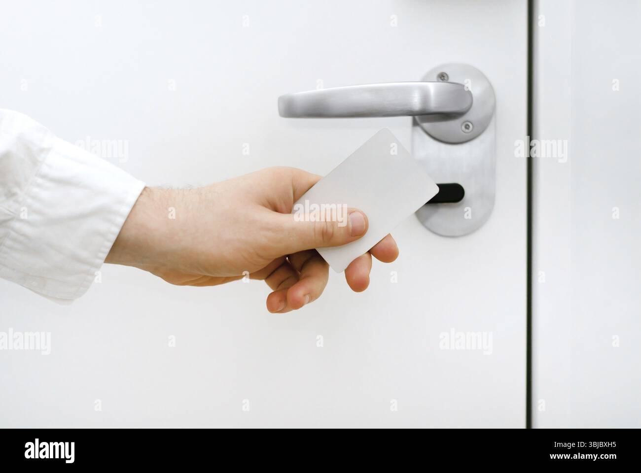 Man using contactless key in the hotel Stock Photo - Alamy