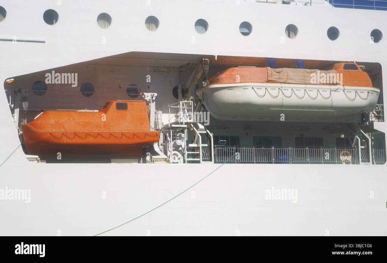 Orange lifeboats on the deck of ferry Stock Photo - Alamy