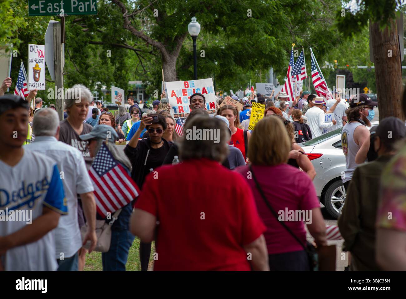 June 14, 2025, Manhattan, Kansas, USA: Protesters line Poyntz Avenue in ...