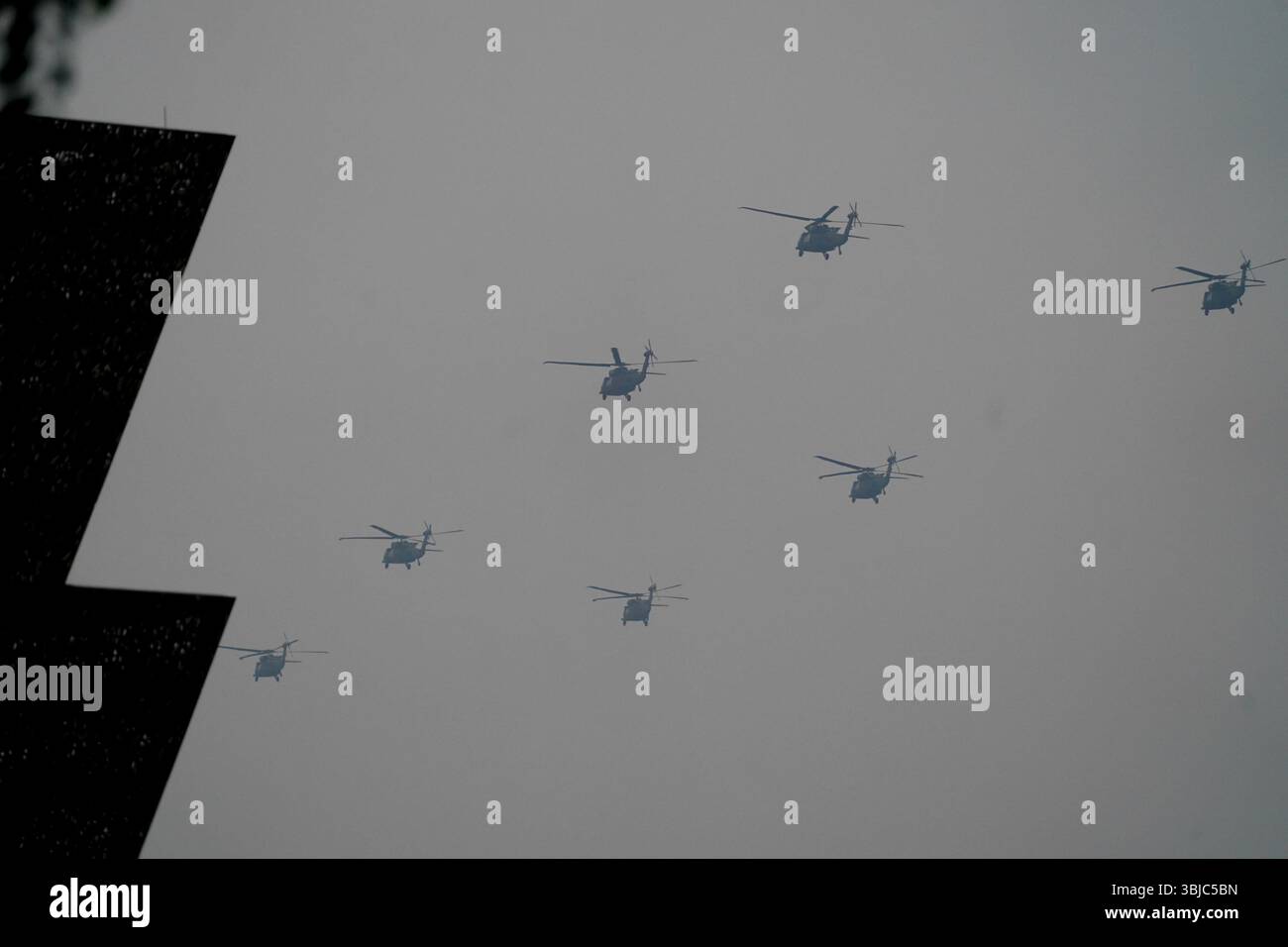 Washington, USA. 14th June, 2025. US Army helicopters perform a flyover ...