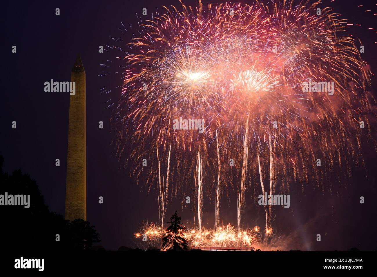 Fireworks burst over the Ellipse during an event to honor the Army's ...