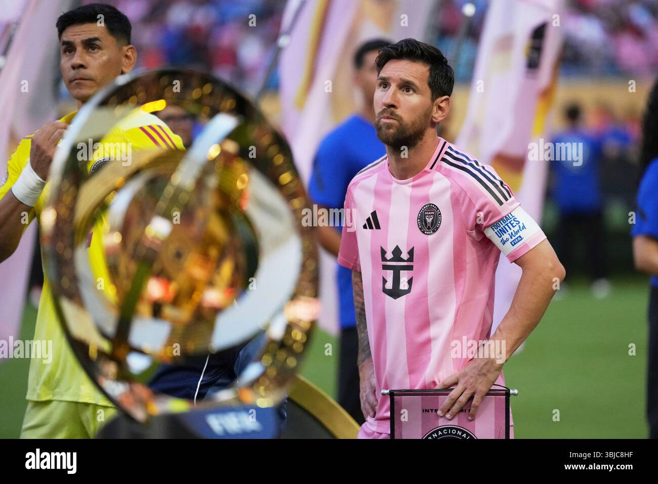 Inter Miami's Lionel Messi, right, and goalkeeper Oscar Ustari stand ...