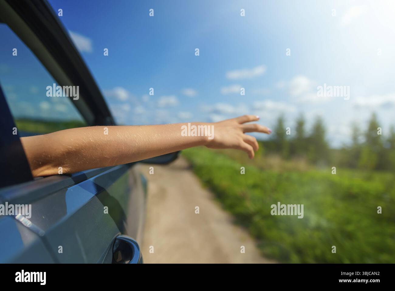 Children's hand outside car window. Summer vacations concept Stock ...