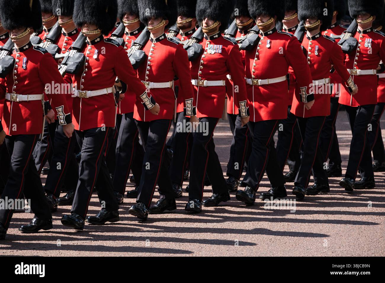 London, UK. 14th June, 2025. Royal Guards march through the Mall. The ...
