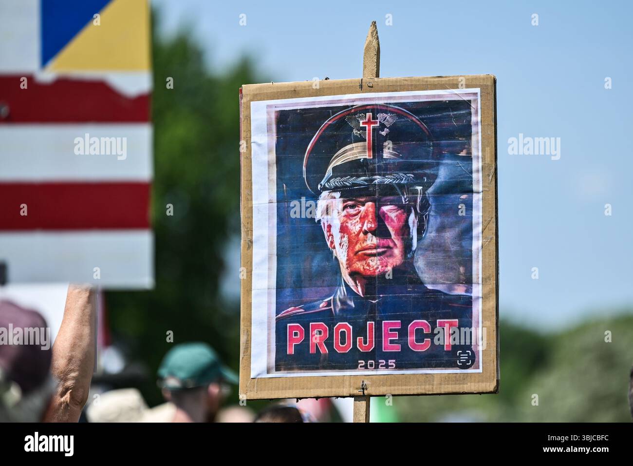 Burlington, Vermont, USA, 14 June, 2025. Anti Donald Trump sign held by ...