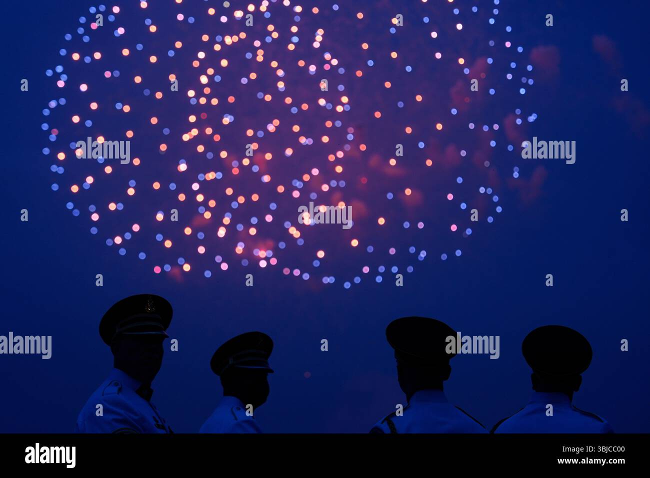 Members of the U.S. Army Band "Pershing's Own" watch fireworks at the ...