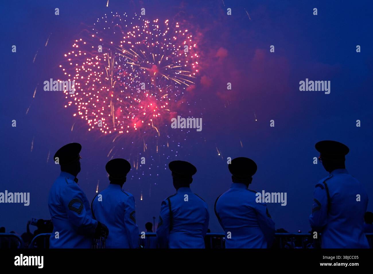 Members of the U.S. Army Band "Pershing's Own" watch fireworks at the ...