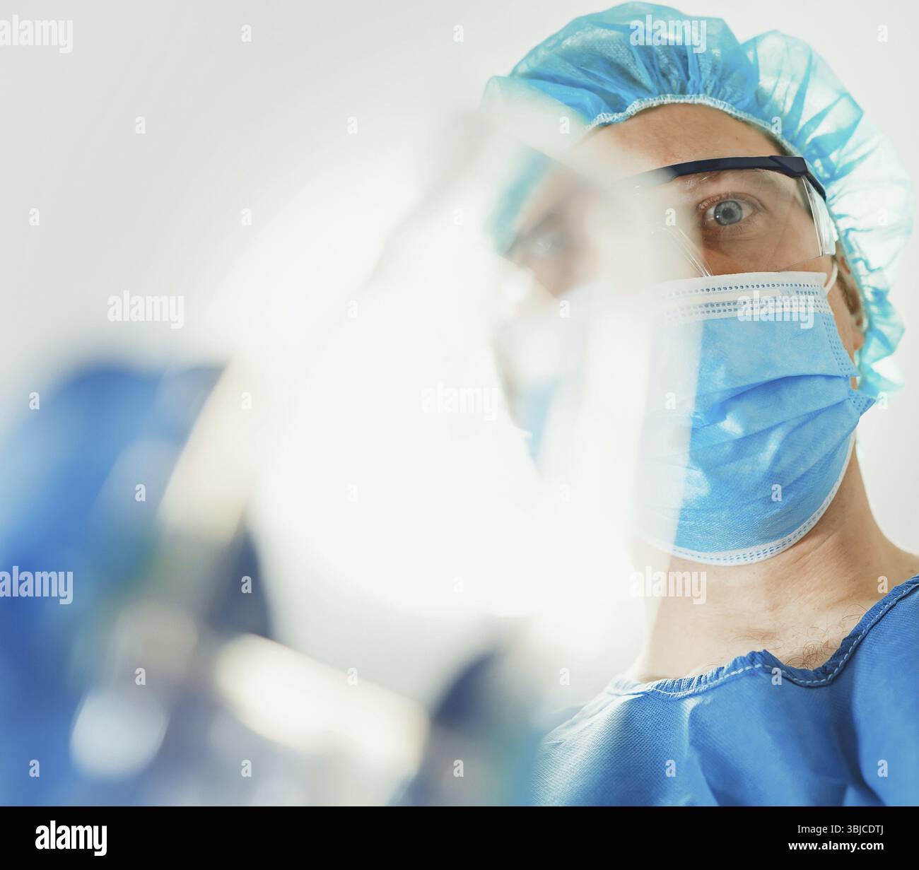 Male anesthesiologist giving gas mask hi-res stock photography and ...