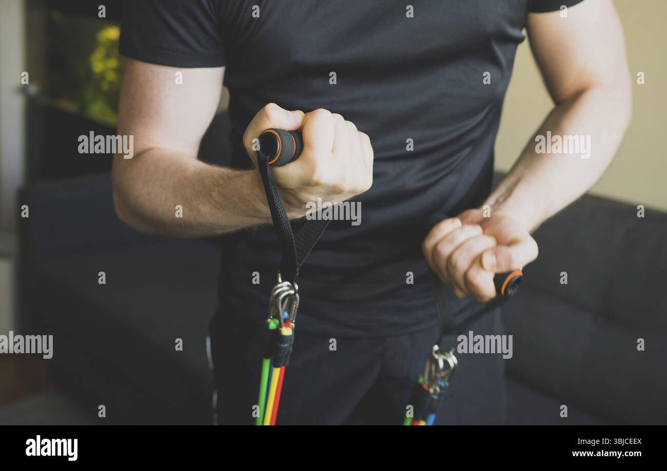 Man exercises resistance bands hi-res stock photography and images - Alamy