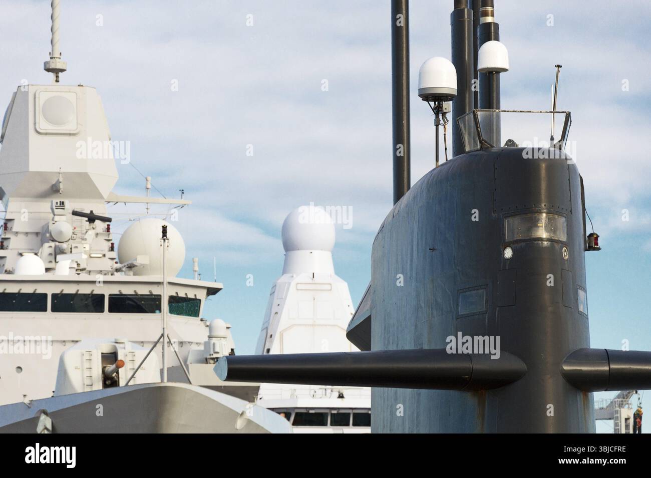Naval fleet. Submarine and warships with guns Stock Photo - Alamy