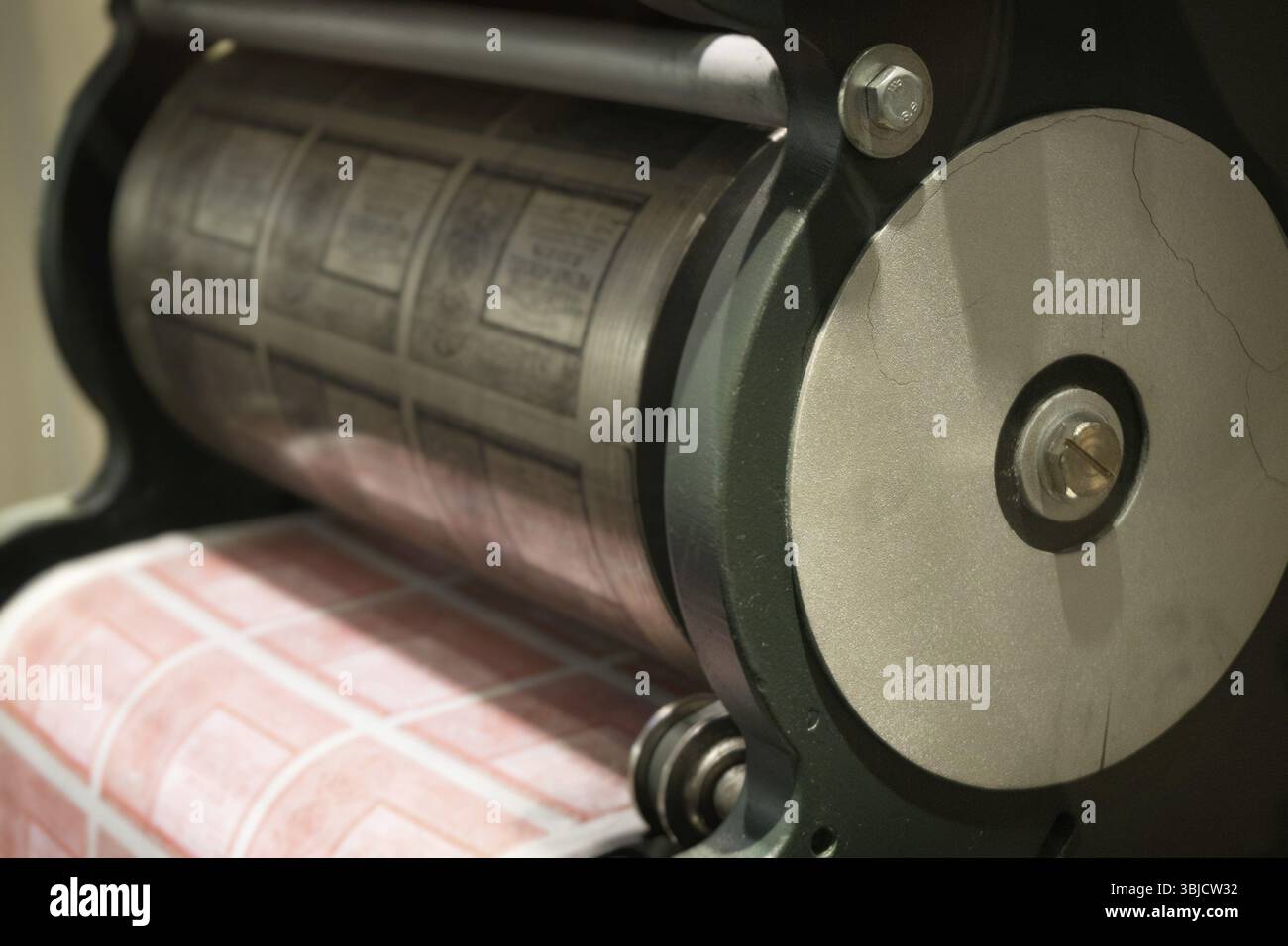 Old money printing machine in a museum Stock Photo - Alamy
