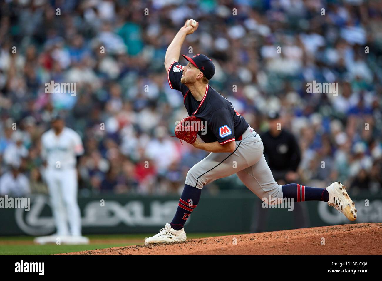 Cleveland Guardians starting pitcher Tanner Bibee throws against the ...