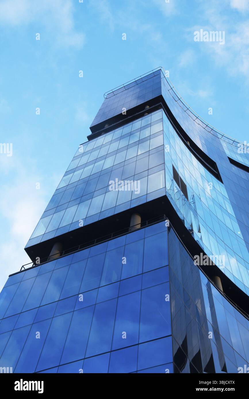 Modern round office building with windows Stock Photo - Alamy