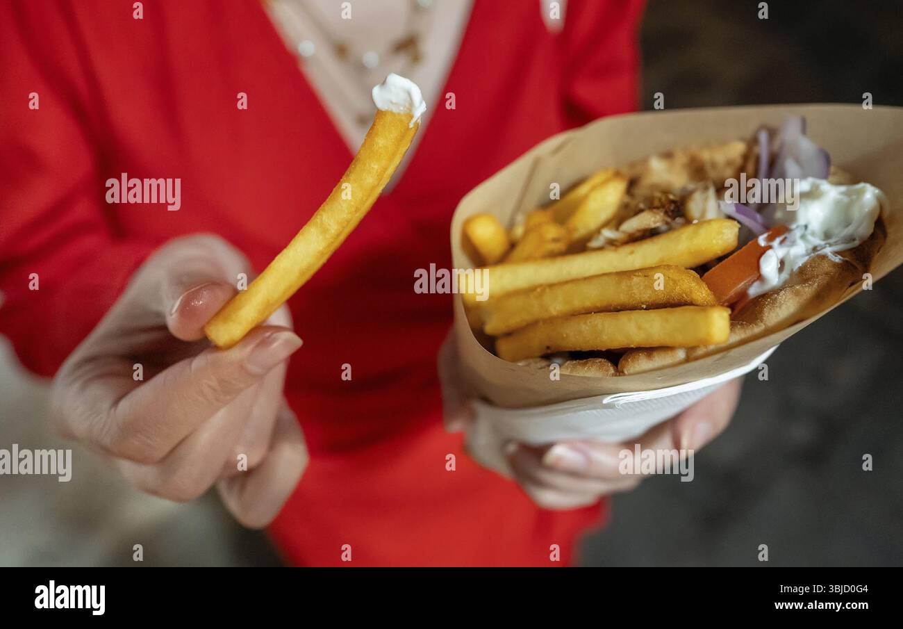 Woman eats fast food hi-res stock photography and images - Alamy