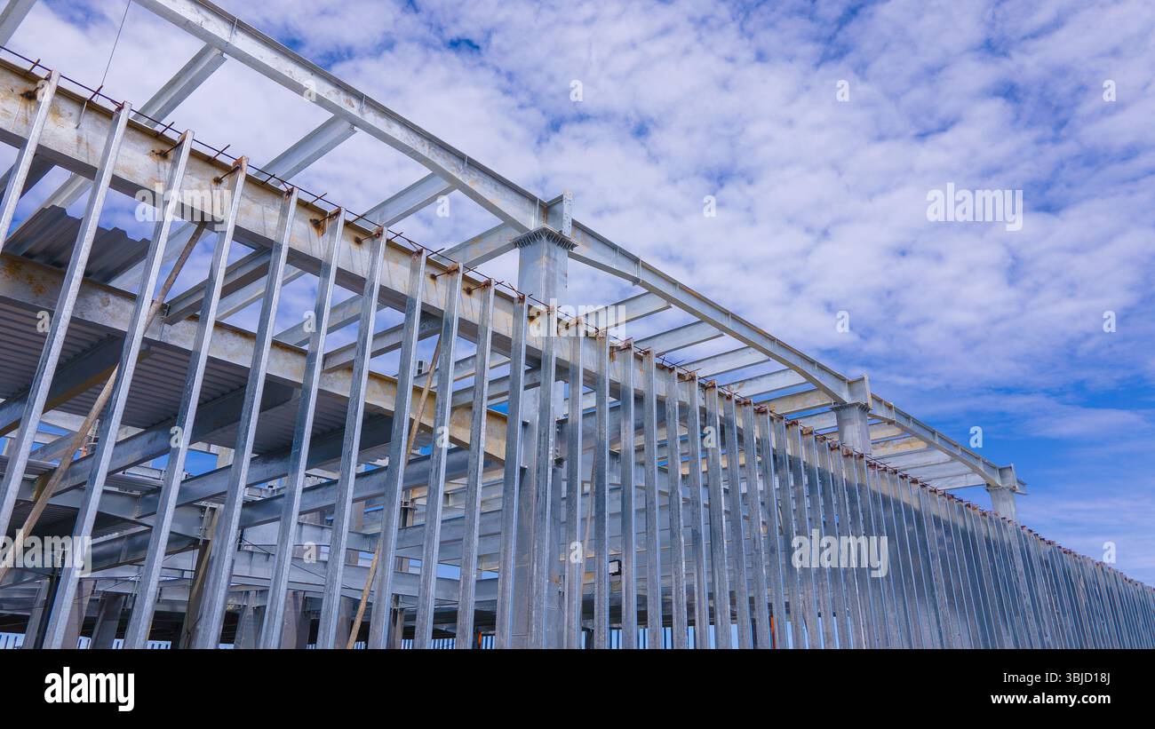 Steel frame of a new commercial building under construction Stock Photo ...