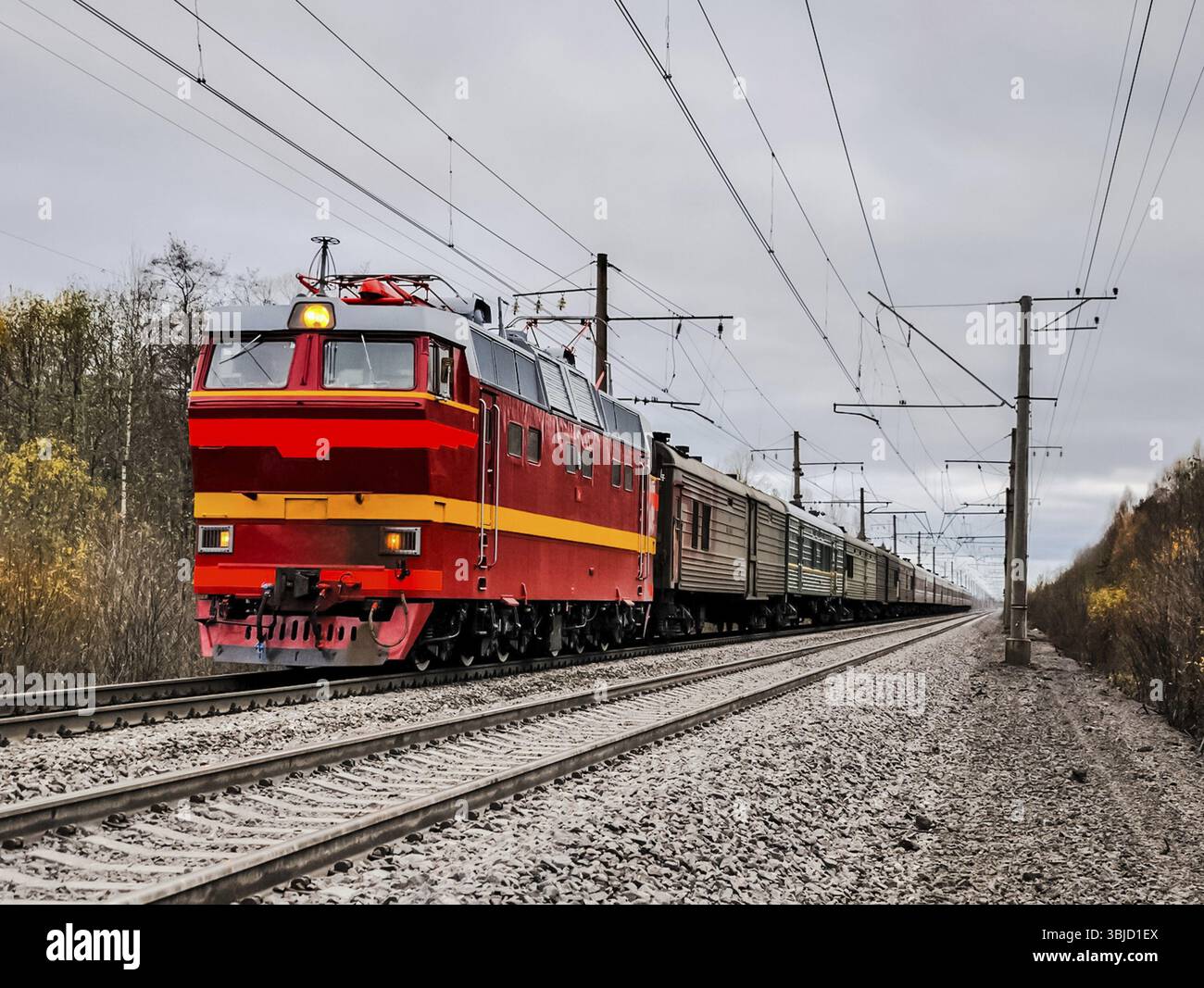 The locomotive is driven by a train on rails. Railway Moving train of ...