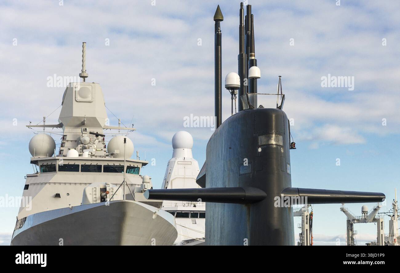 Naval fleet. Submarine and warships with guns Stock Photo - Alamy