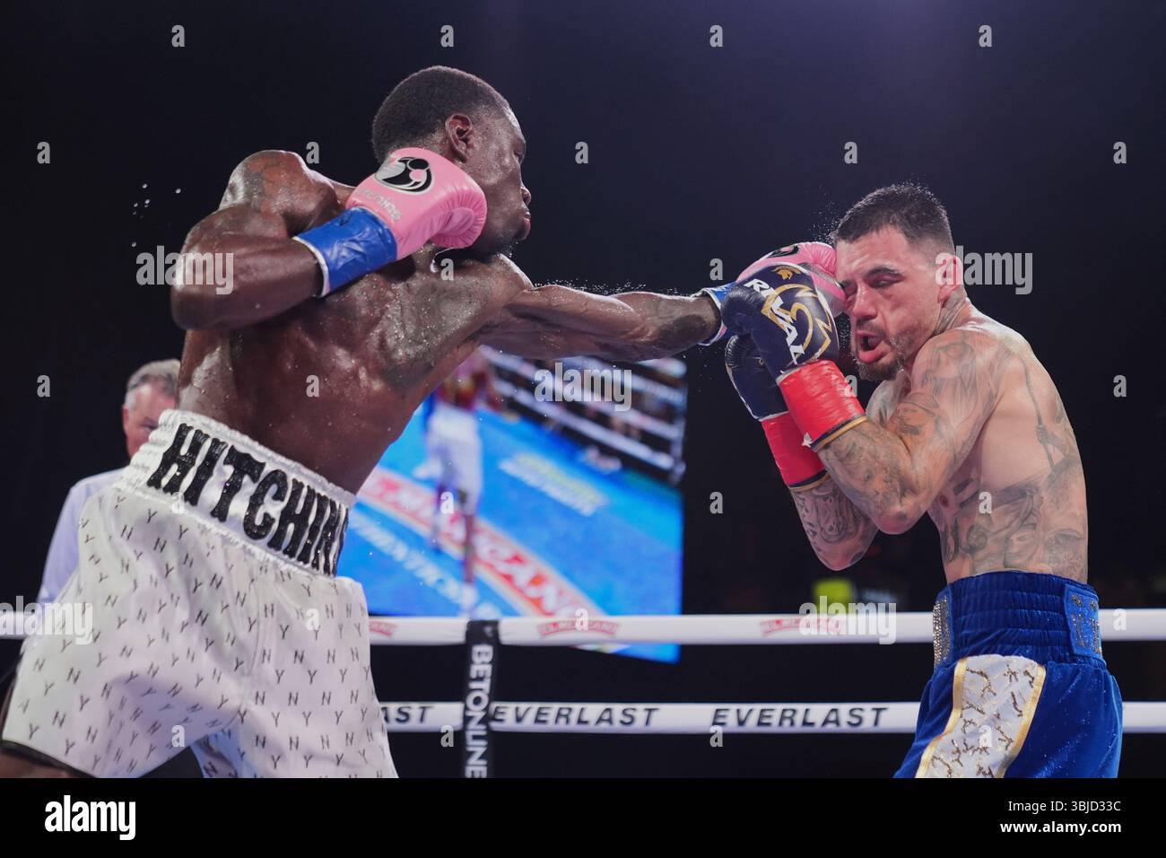 Richardson Hitchins punches Australia's George Kambosos Jr. during the ...