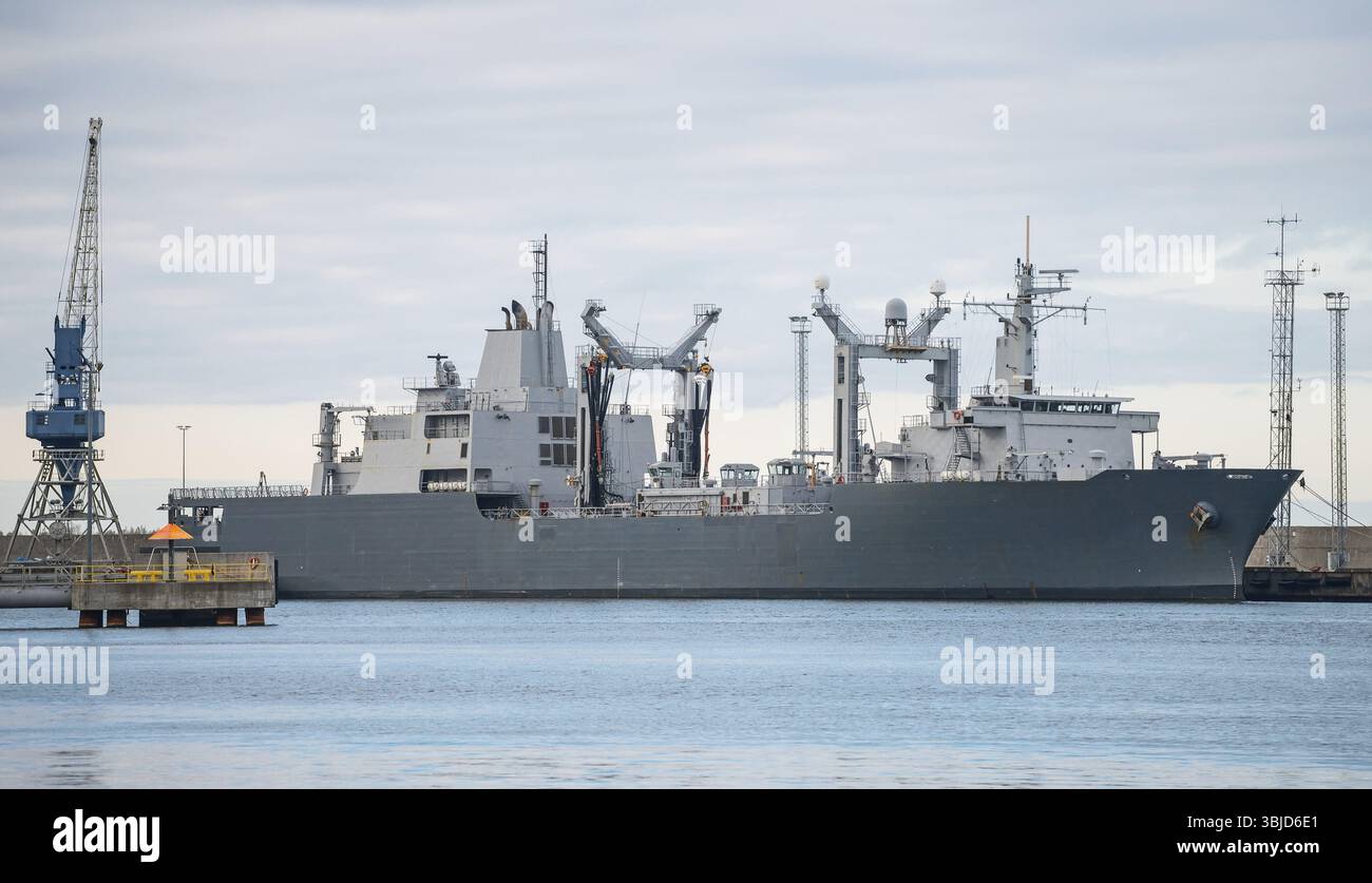 Naval auxiliary ship in the port Stock Photo - Alamy