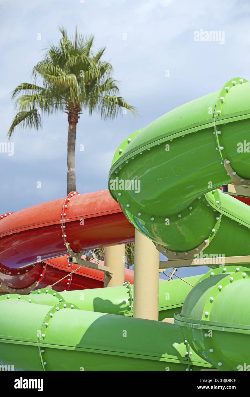 Colorful water slides in waterpark resort Stock Photo - Alamy