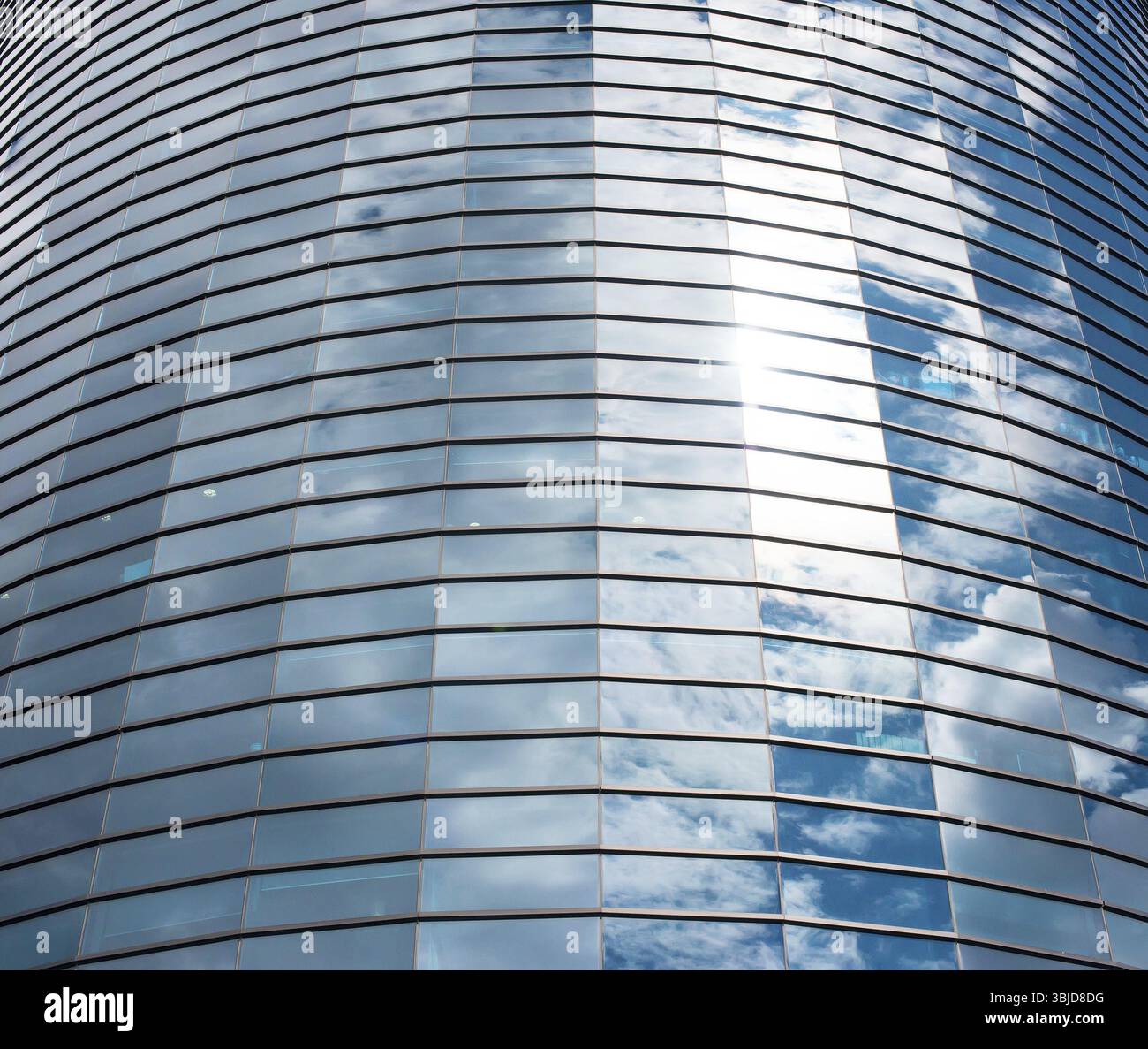 Modern round glass building in the city Stock Photo - Alamy
