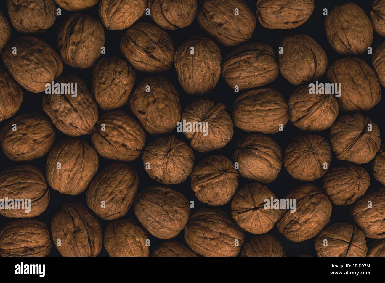 Dramatic photo of walnut nuts, suitable for backgrounds Stock Photo - Alamy