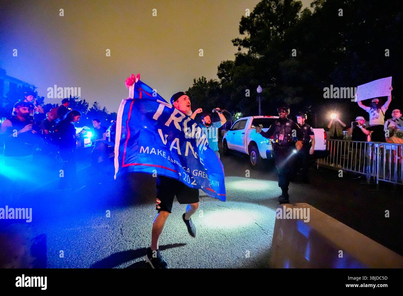 Washington Dc, United States. 14th June, 2025. A Trump supporter taunts ...