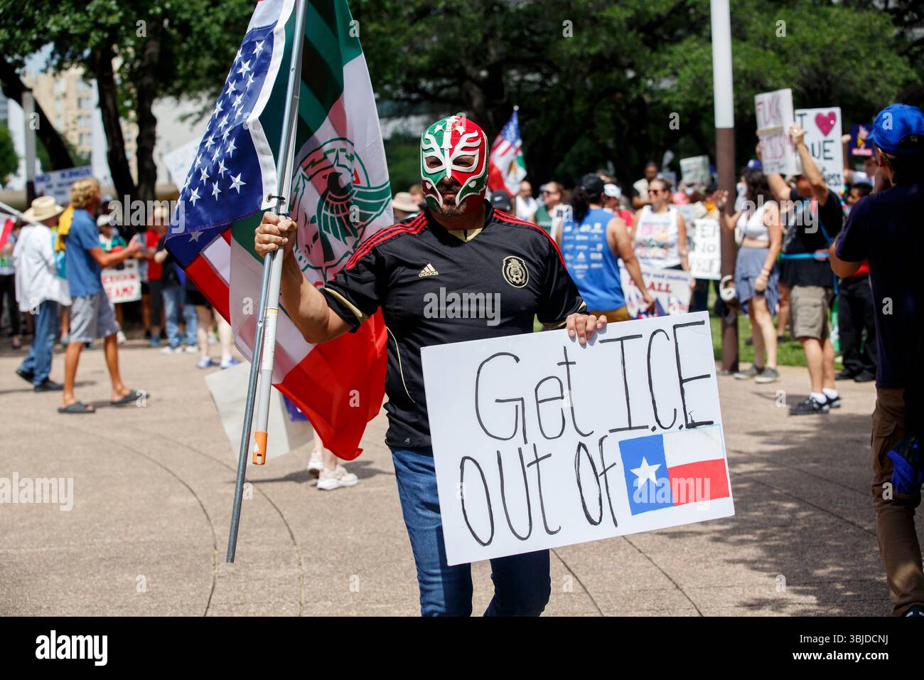 Dallas, Texas, USA. 14th June, 2025. A man dressed as a "luchador"" or ...