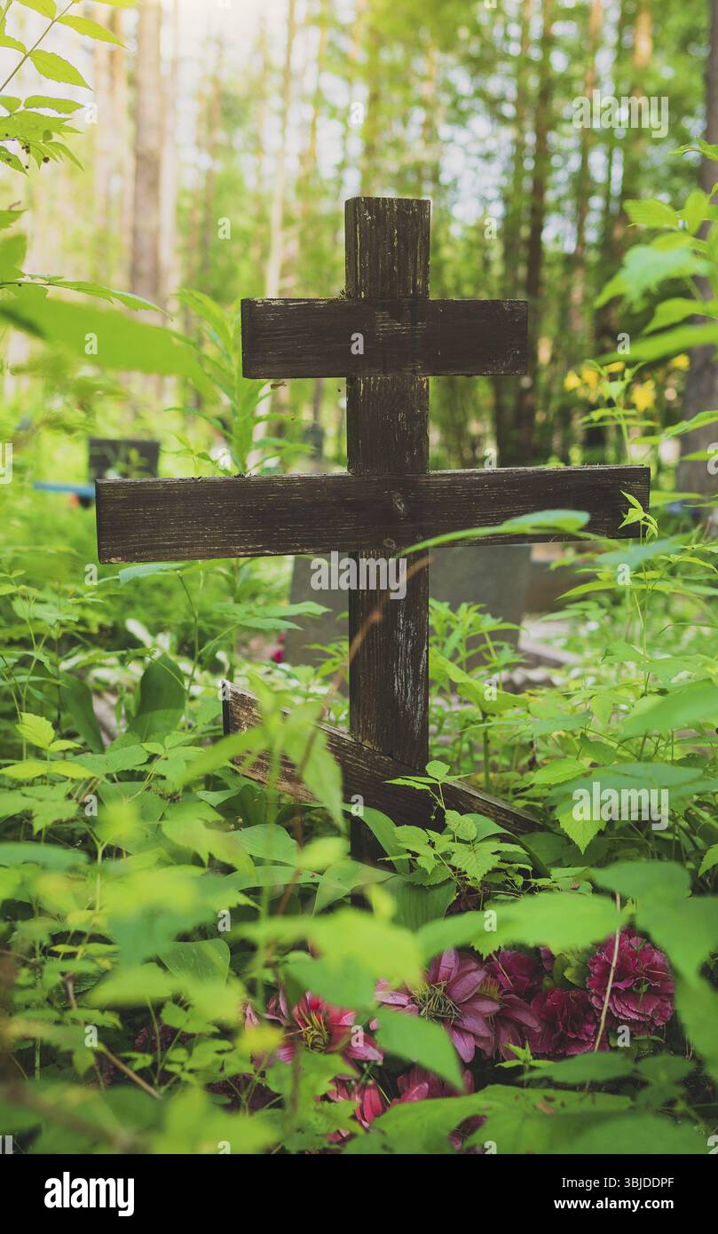 Old forgotten grave in the forest cemetery Stock Photo - Alamy