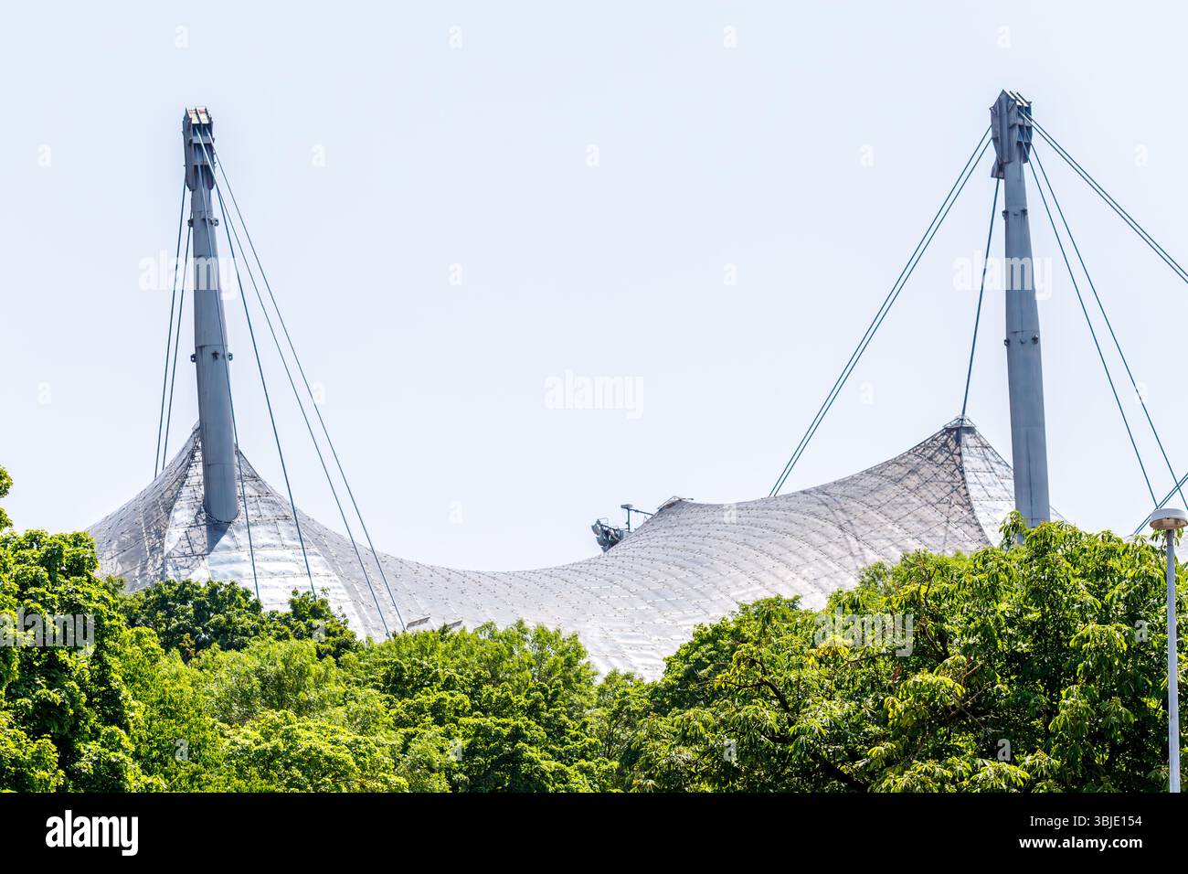 Architectural view featuring a distinctive stadium roof structure with ...