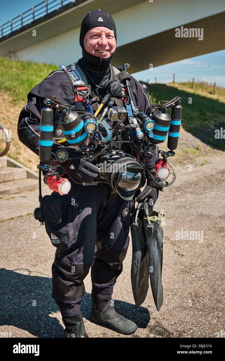 May 20, 2025 - Zierikzee-Netherlands: Diver with underwater camera gear ...