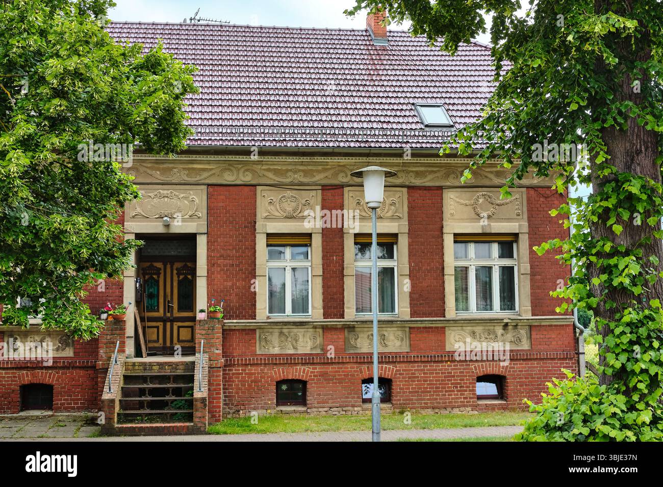 June 10, 2025 - Teschendorf‑Germany: Traditional village house in ...