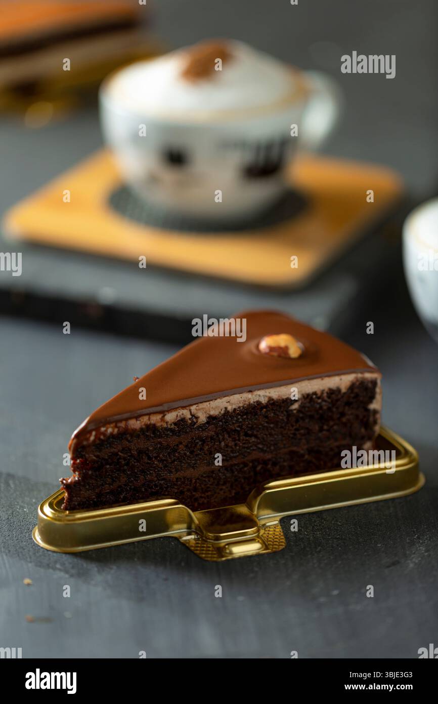 Nutella chocolate cake slice, filled with premium Nutella spread Stock ...