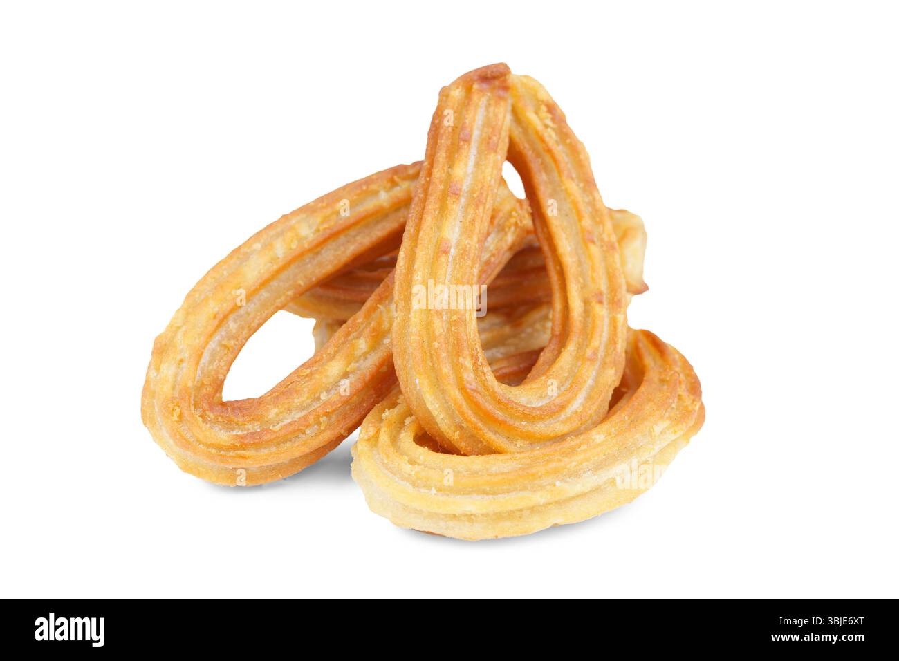 Heap of traditional spanish dessert churros, fried dough pastry ...