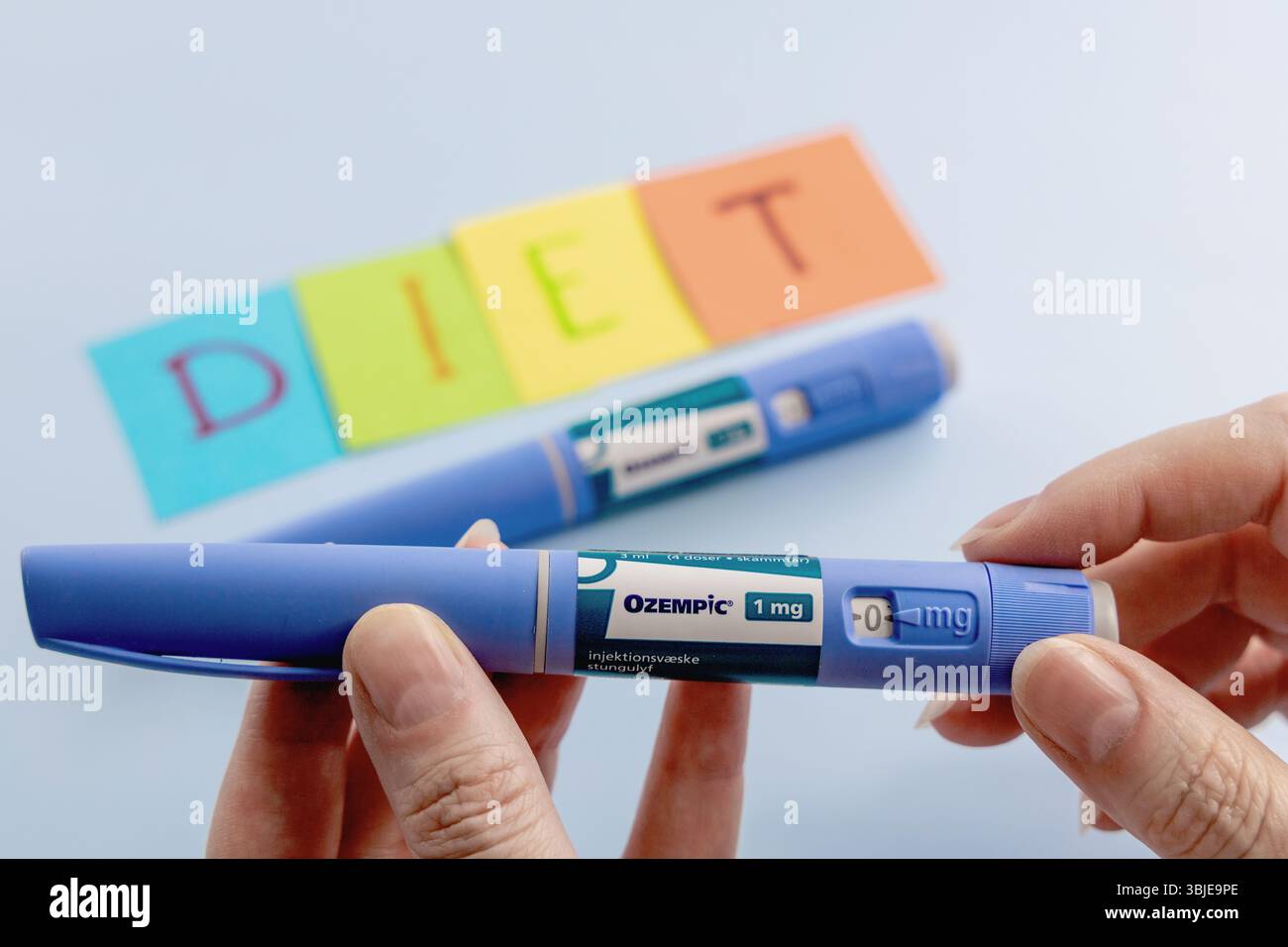 Ozempic pen for diabetics and weight loss in female hands and diet ...