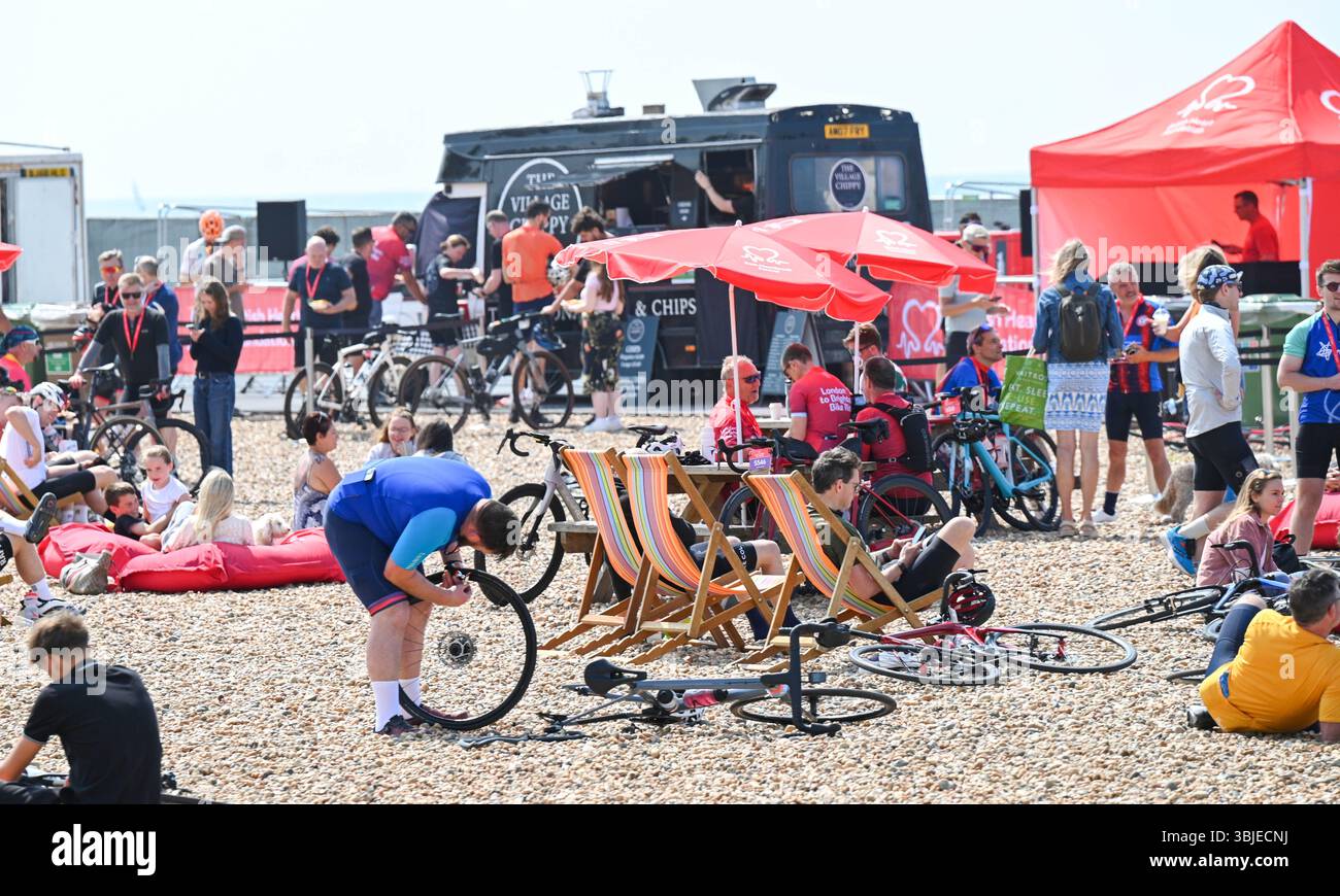 Brighton UK 15th June 2025 - Time to relax on the beach after ...