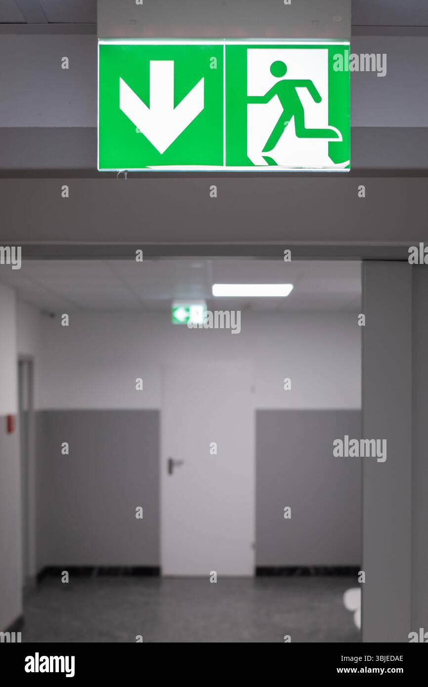 emergency exit marking over the door Stock Photo - Alamy