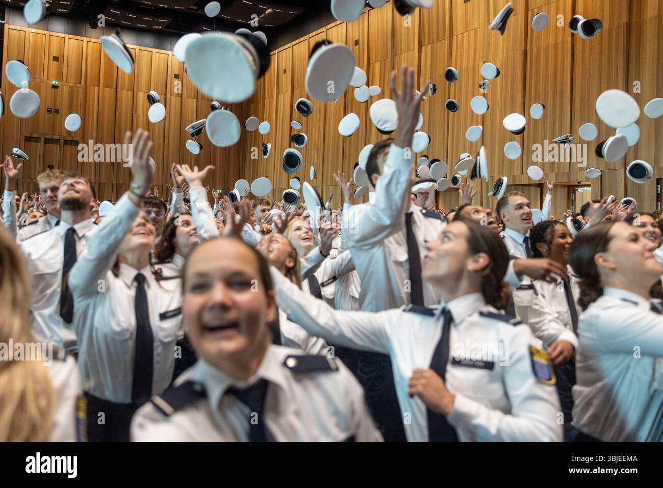 dpatop - 15 June 2025, Hesse, Bad Vilbel: Police officers throw their ...
