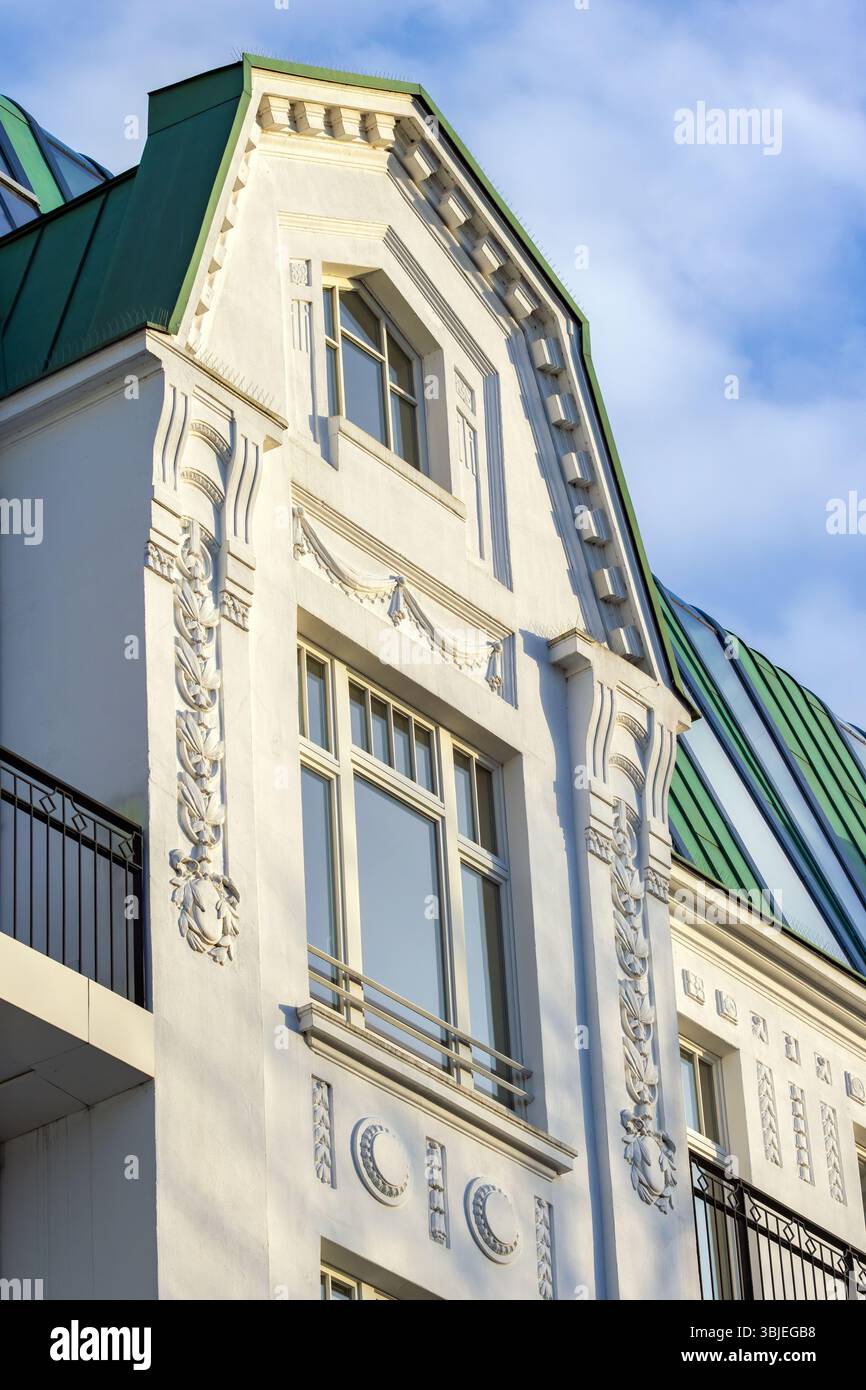 Stucco-decorated gable of a high-quality renovated old building Stock ...