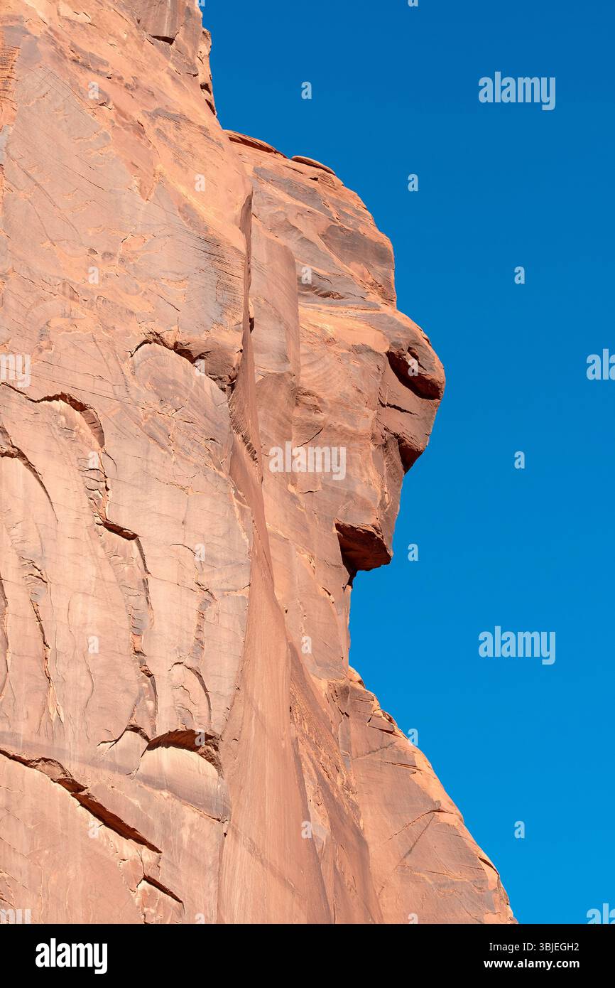 Rock formation resembling a human face in the Monument Valley Navajo ...