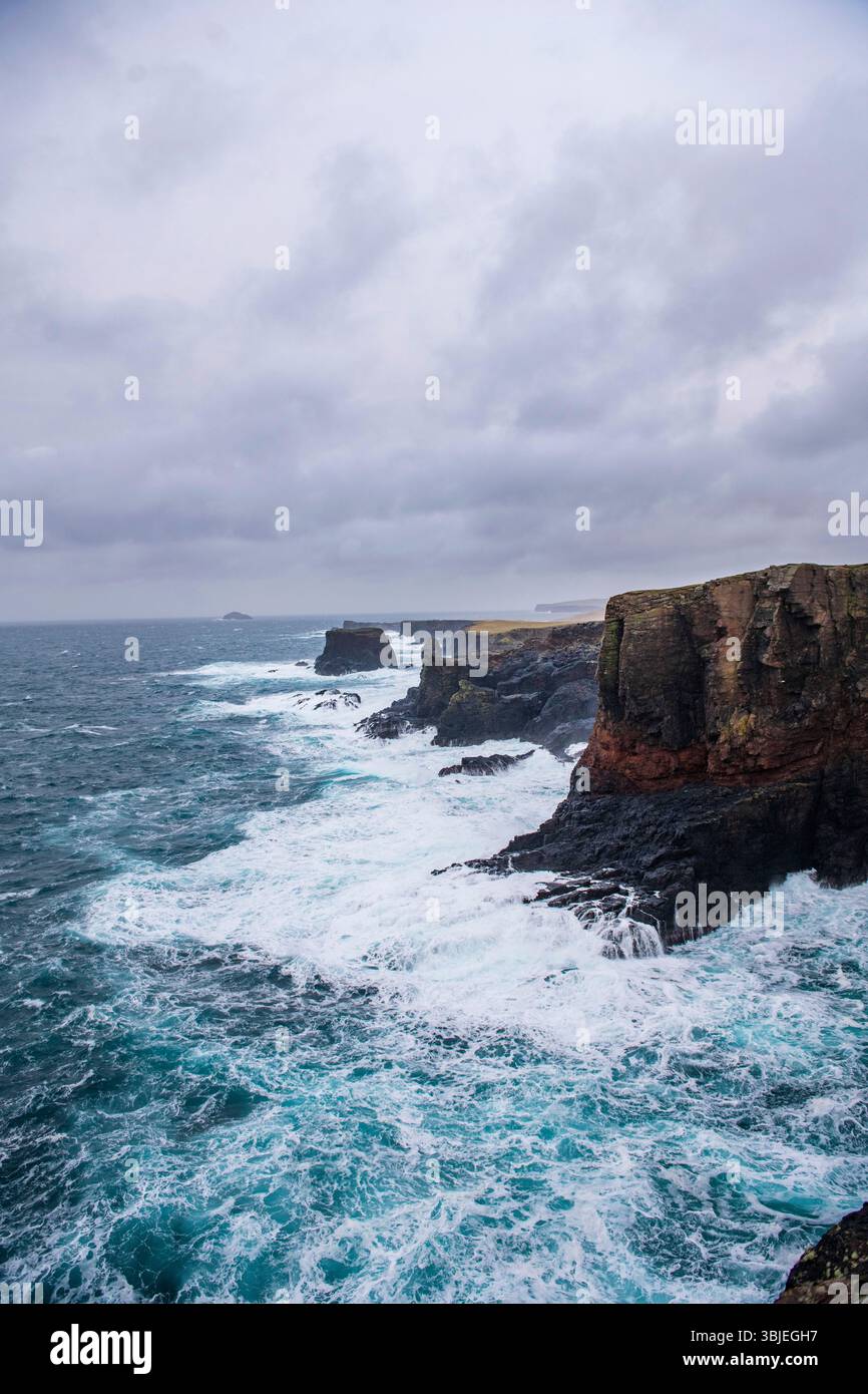 Stormy skies over Eshaness Cliffs and lighthouse in Shetland ...