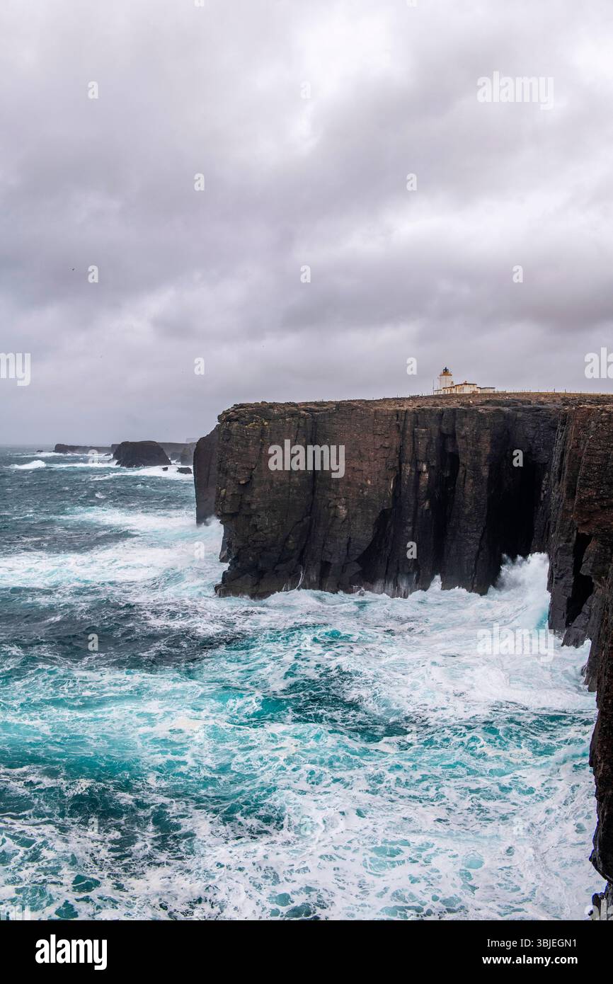 Stormy skies over Eshaness Cliffs and lighthouse in Shetland ...