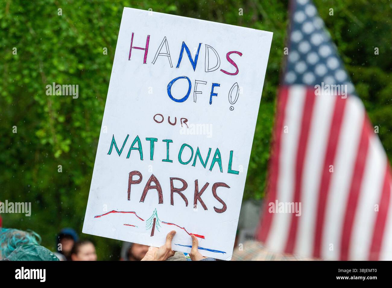 Handmade sign with, "Hands Off Our National Parks," at a peaceful No ...