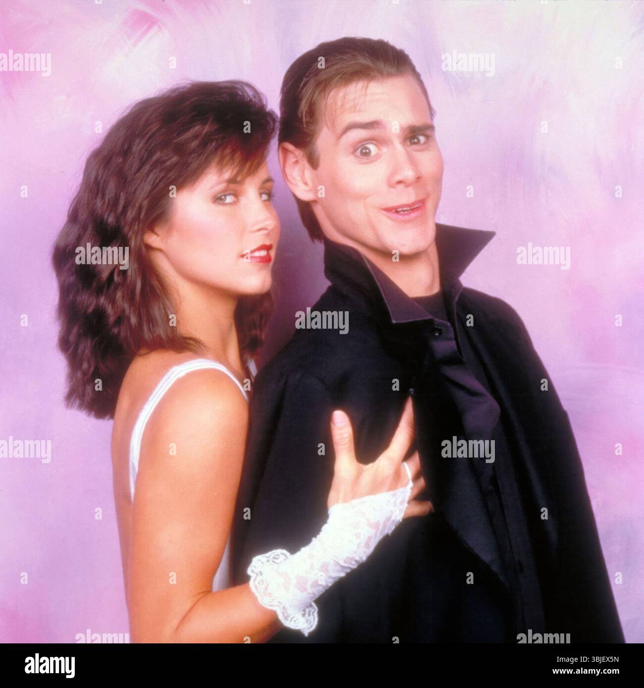 JIM CARREY and KAREN KOPINS in ONCE BITTEN (1985), directed by HOWARD STORM. Credit: SAMUEL ...