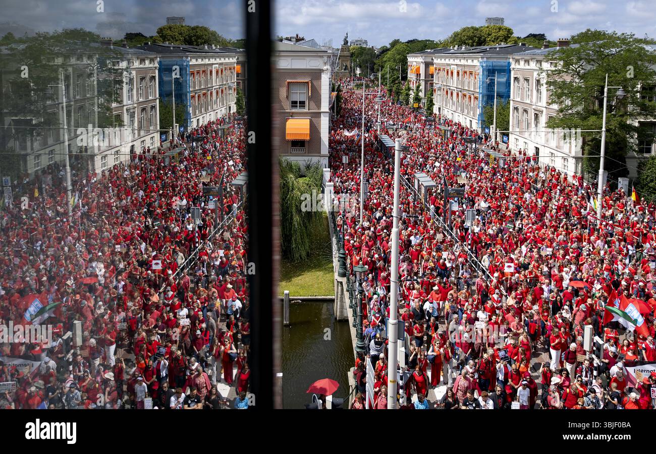 DEN HAAG - Activists walk through the center, during a demonstration ...
