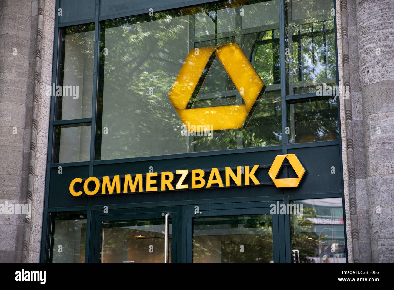 The Commerzbank logo is seen on the façade of its branch on ...