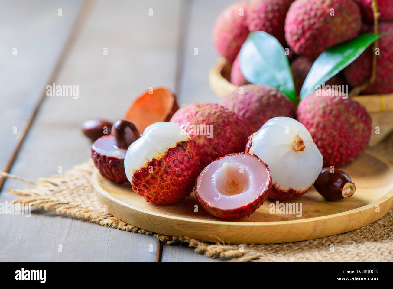 Juicy Fresh Lychee in Bamboo Basket on Rustic Wooden Table – Tropical ...