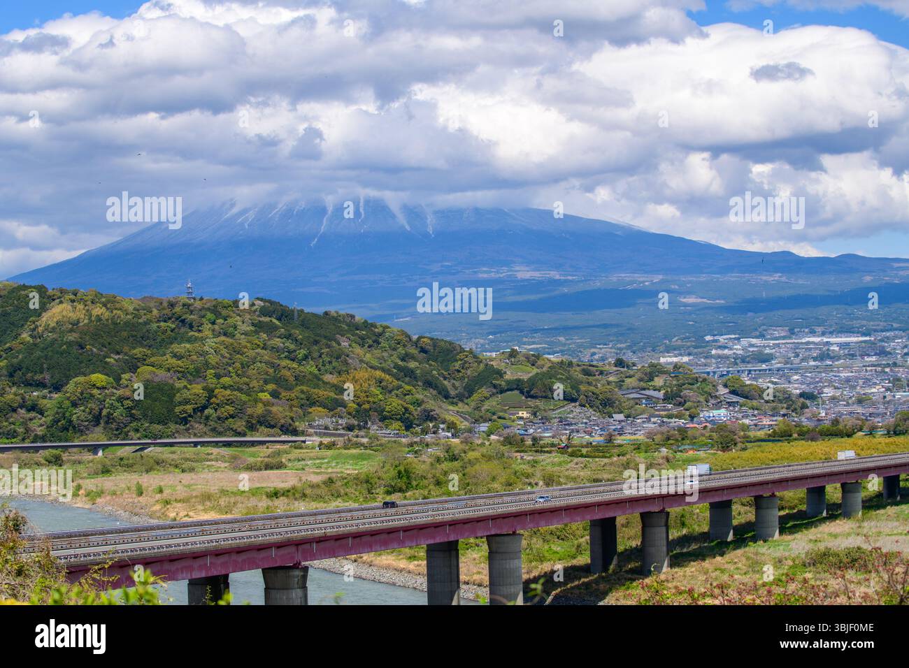 This panoramic landscape captures the peaceful coexistence of urban ...