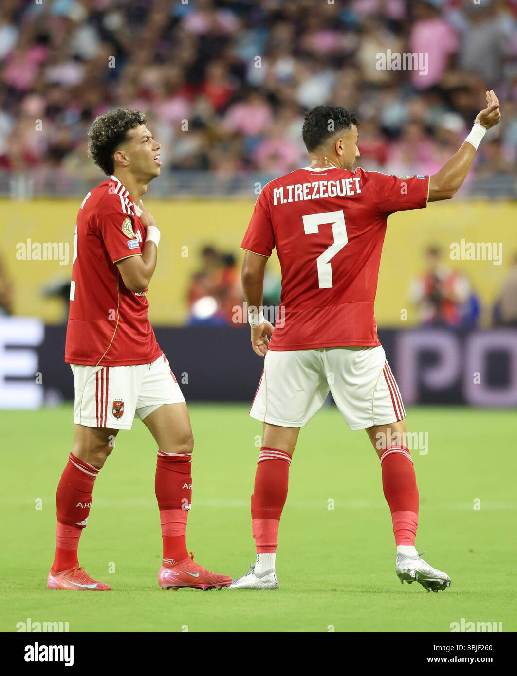 Al Ahly FC midfielder Akram Tawfik (22) and Al Ahly FC midfielder ...
